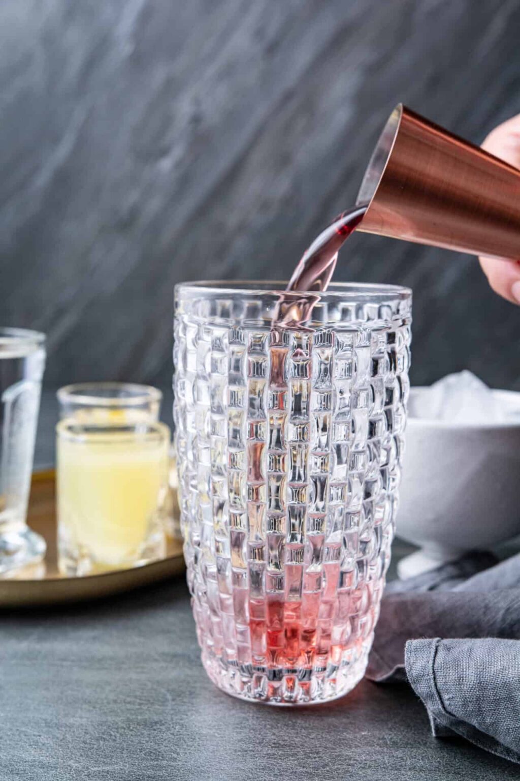 Tay-Tini Cocktail (Taylor Swift's Cosmopolitan Twist) - Twist and Toast