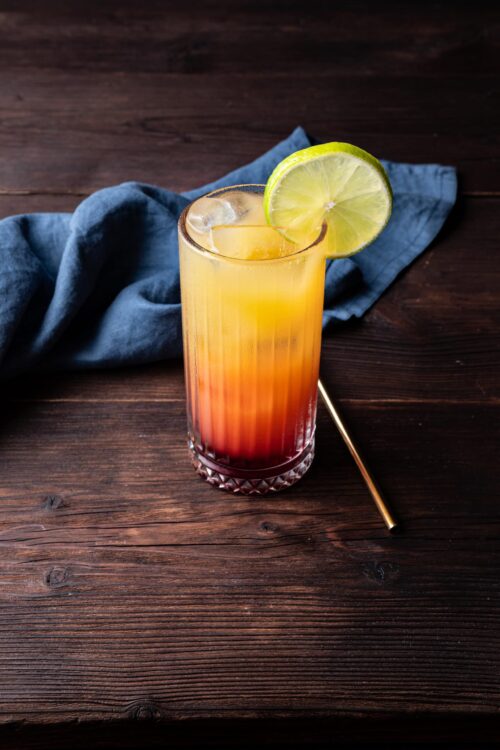Rum Sunset Cocktail - Twist and Toast